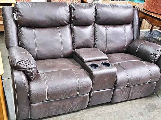 This leather loveseat has seen some Netflix, but it's ready for your binge sessions now &ndash; at a fraction of retail price.
