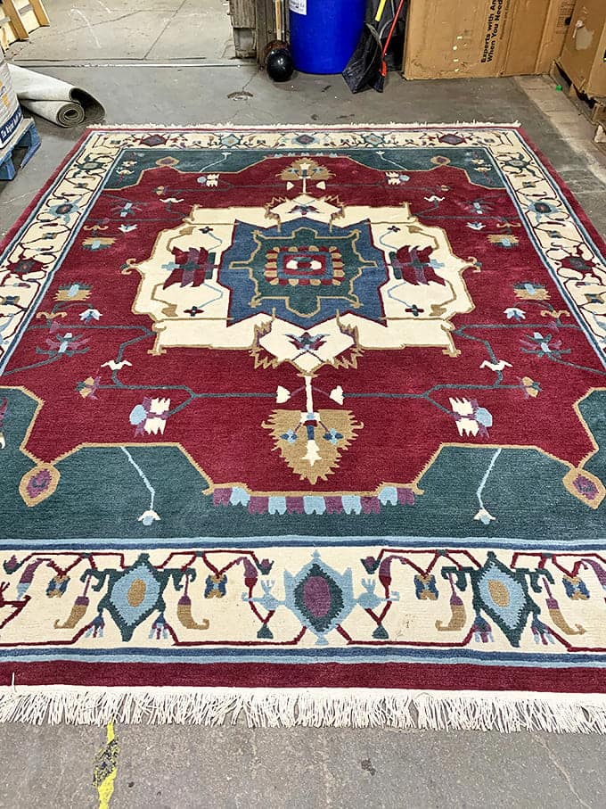 A handcrafted rug that traveled continents to end up in Omaha. Now it just needs to travel the few miles to your living room.