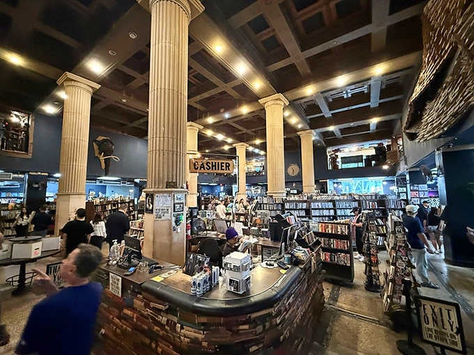 Where commerce meets literature under soaring columns. The cashiers probably know more about books than most English professors.