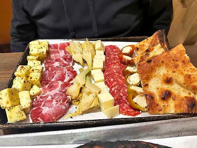 The appetizer board that asks, "Why rush to the main event?" A Mediterranean prelude worthy of its own standing ovation.