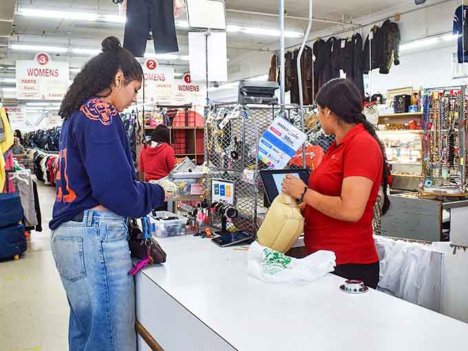 The final frontier of the thrift store journey – where purchases become possessions and staff members witness the joy of successful treasure hunting.