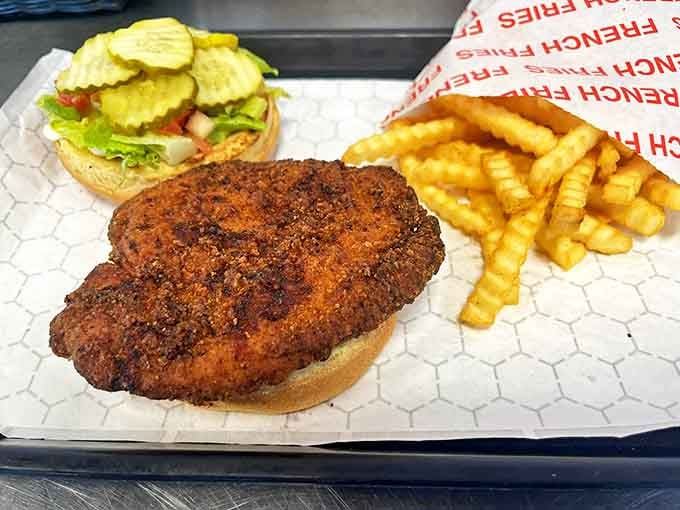 This chicken burger means business with its perfectly crisp coating and golden fries&mdash;comfort food that speaks a universal language of satisfaction.