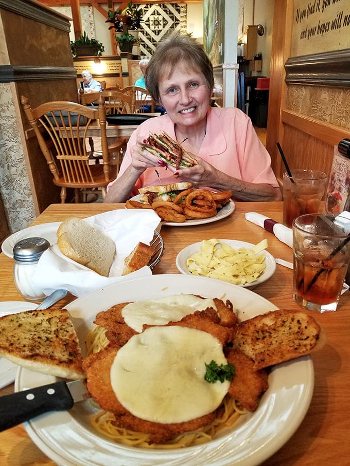 The universal language of satisfaction&mdash;when the food arrives and conversation pauses for that first perfect bite.