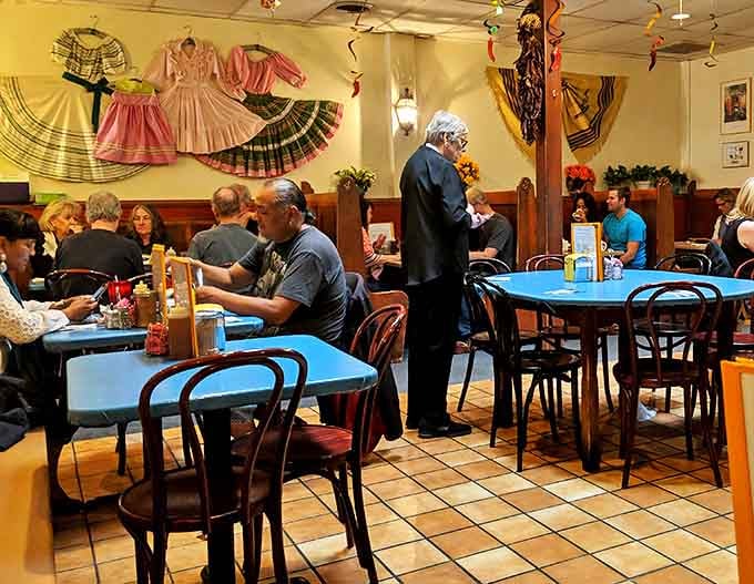 Where locals and visitors share tables and stories. The dining room hums with the universal language of "mmm" and "pass the hot sauce."
