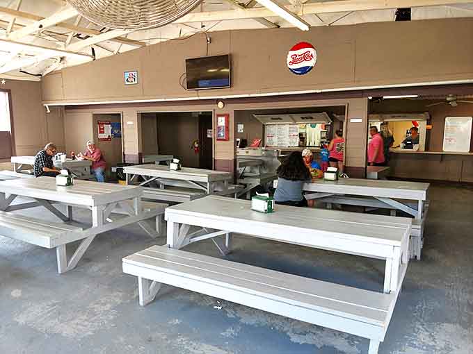The flea market food court: where treasure hunting fuel comes with a side of people-watching and deal-comparing conversation.