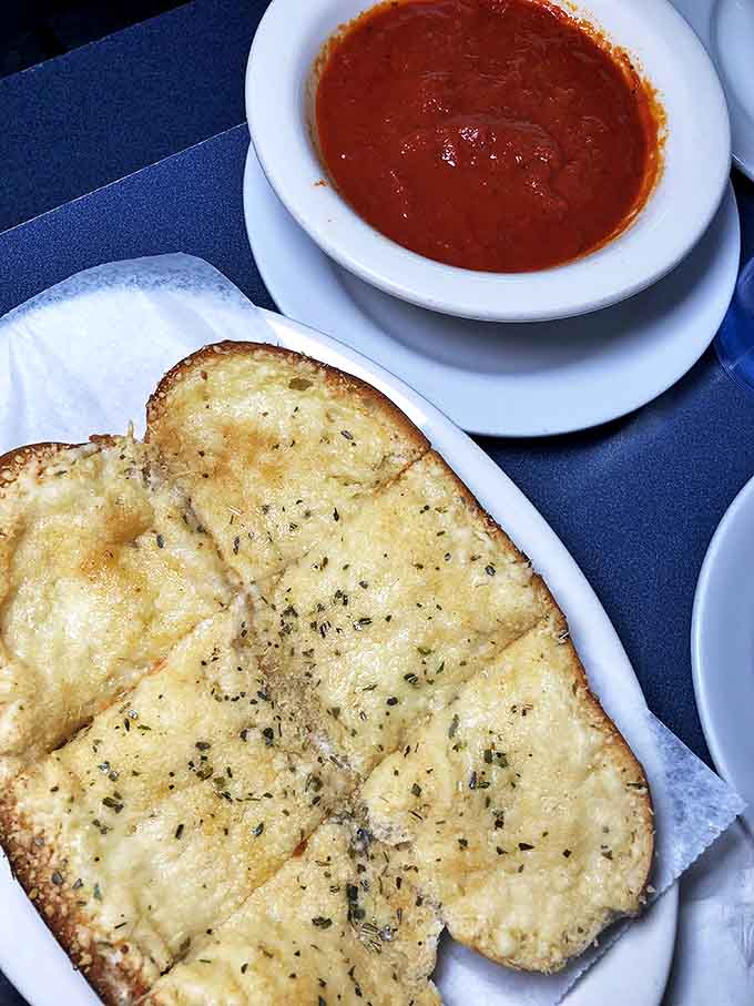 Garlic bread and marinara &ndash; the opening act that deserves a standing ovation. Simple, perfect, and impossible not to finish before the pizza arrives.