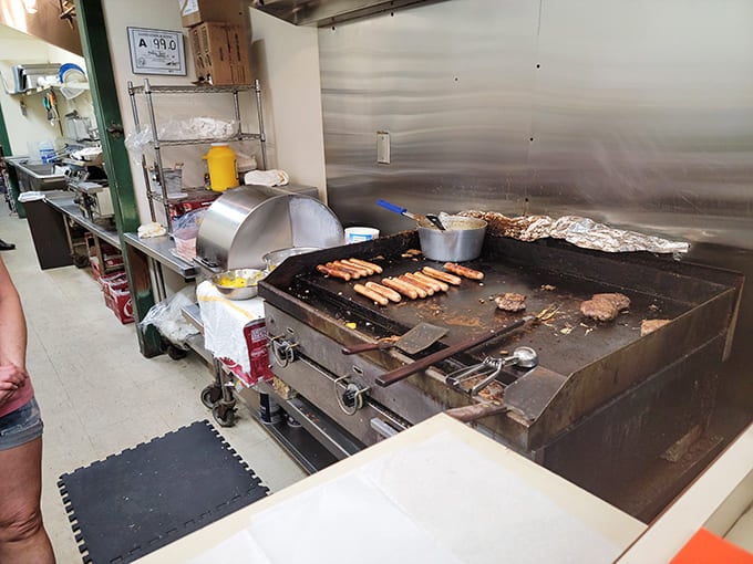 The sacred flat-top grill where ordinary meat is transformed into extraordinary memories, one sizzling patty at a time.