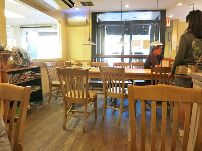 The dining room whispers conversations of regulars and first-timers alike, all united by the universal language of exceptional food.