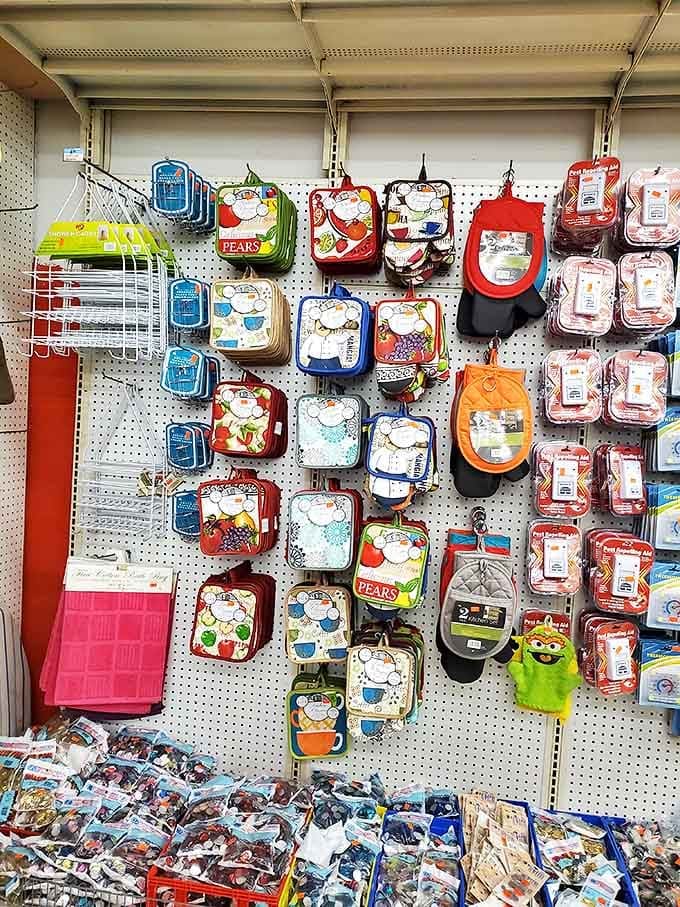 Kitchen potholders featuring cheerful chefs that somehow make burning dinner seem like a charming possibility rather than a disaster.
