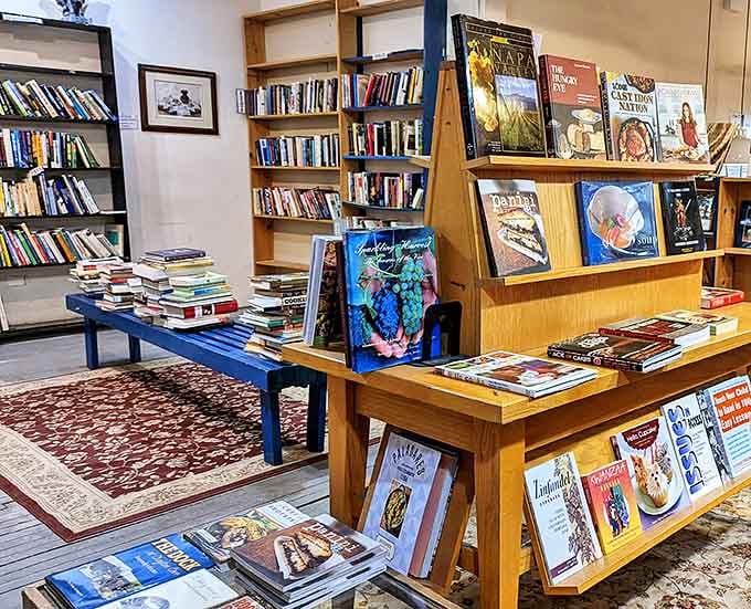 Art books displayed like museum pieces, reminding us that sometimes the container is as beautiful as what it contains.