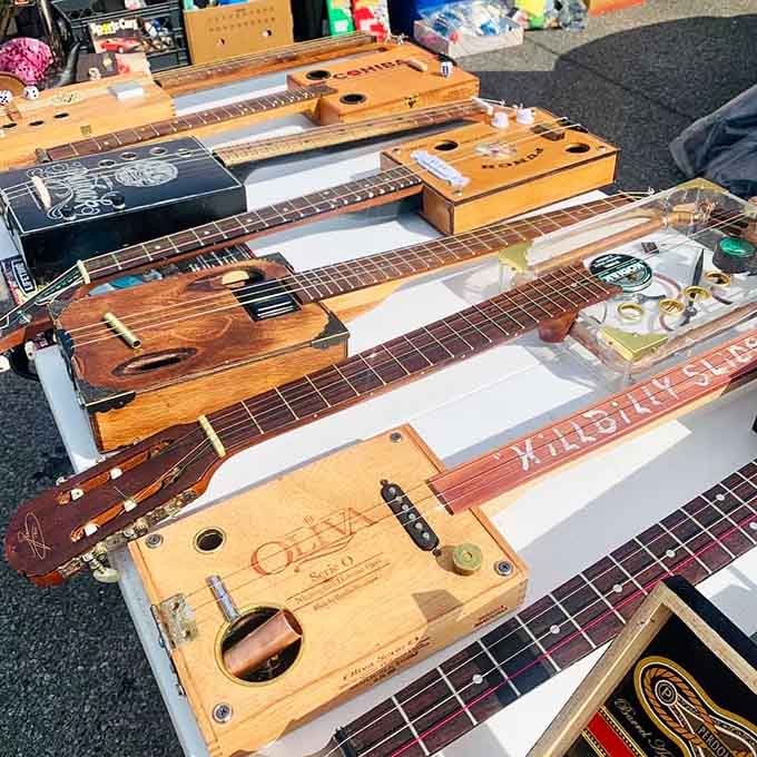 These handcrafted string instruments prove that music sounds better when it comes from repurposed cigar boxes and weathered wood.