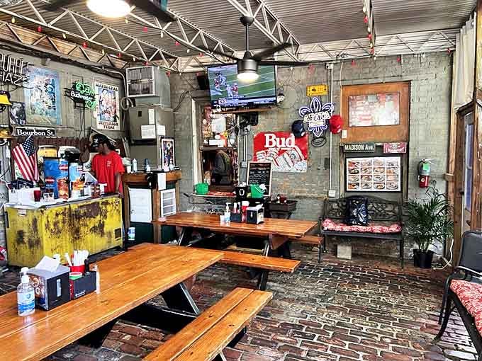 The patio area doesn't need fancy umbrellas or mood lighting &ndash; the food provides all the atmosphere you need. Simple wooden tables that have witnessed countless "mmms" of approval.