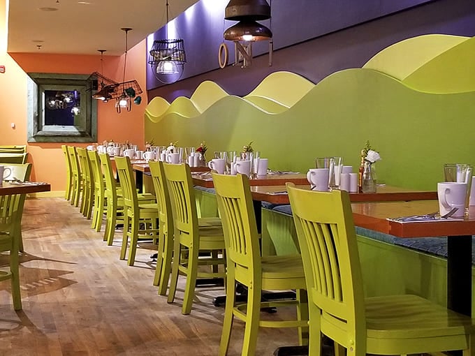 The dining area's playful color palette and undulating wall design create a space that's both energizing and somehow soothing&mdash;like breakfast itself.