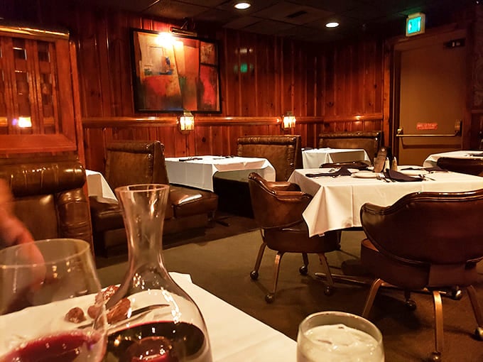 Wood-paneled walls, white tablecloths, and leather chairs&mdash;the dining room whispers, "Take your time, we've been here awhile."