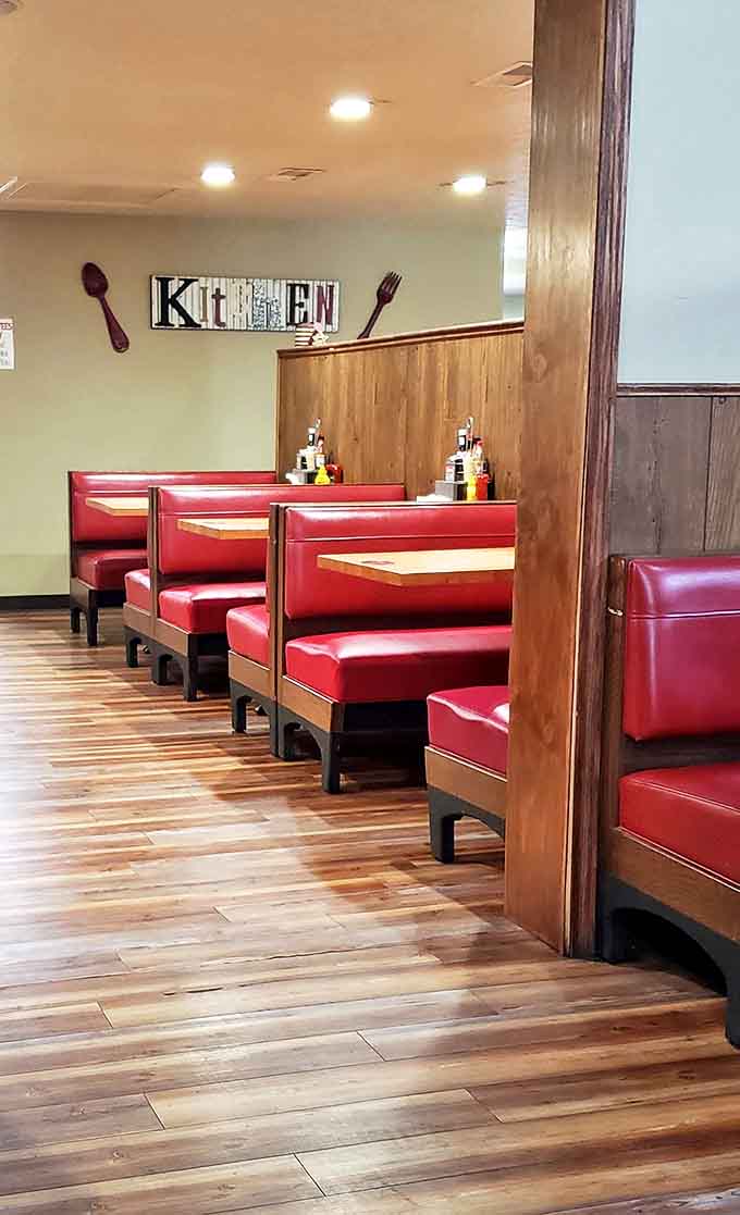 The dining room layout follows the classic diner theorem: maximum seating without sacrificing the all-important elbow room for proper eating mechanics.