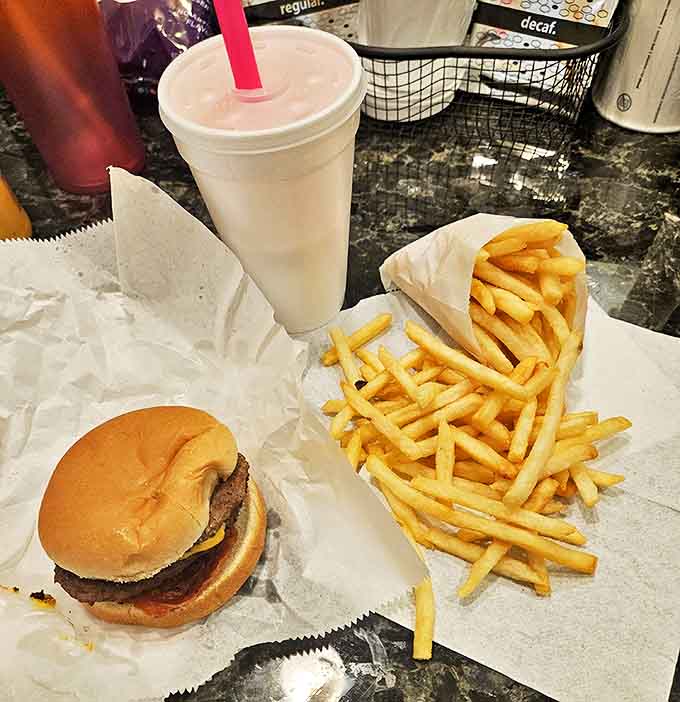 The holy trinity of American fast food done right: burger, fries, and shake. A meal that proves paradise doesn't need a passport or a second mortgage.