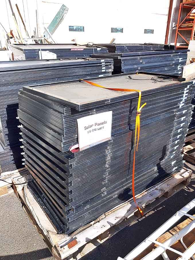 Solar panels stacked like playing cards in the world's most sustainable deck&mdash;powering homes while saving both money and planet.