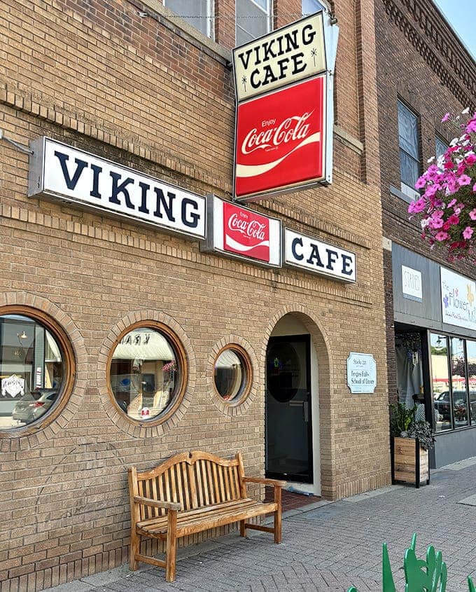 Another angle of the iconic facade &ndash; where the wooden bench outside invites you to pause before entering or linger after a meal well enjoyed.