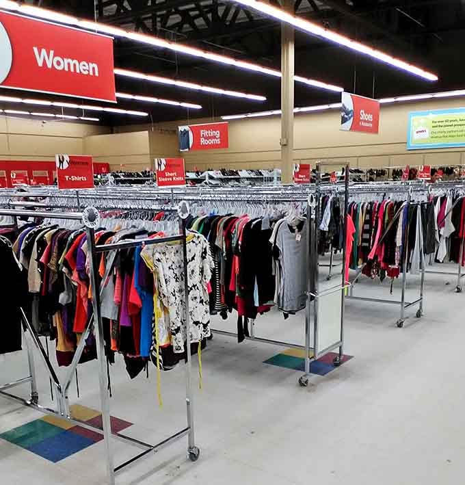 The women's clothing section stretches toward the horizon. Clear signage makes navigating this sea of fashion possibilities surprisingly manageable.