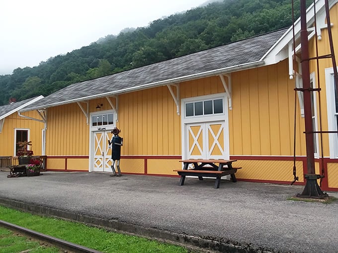 Railroad history reimagined in sunshine yellow, this former depot now houses local artisans whose creations tell modern stories in this historic space.