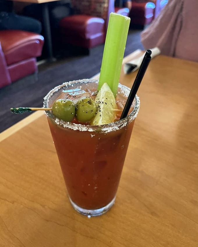 A proper Bloody Mary isn't just a drink—it's a garden in a glass with enough garnishes to count as a small appetizer.