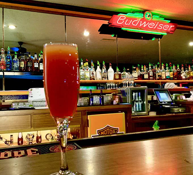 The local bar serves up colorful concoctions alongside Wyoming hospitality &ndash; where happy hour stories flow as freely as the drinks.