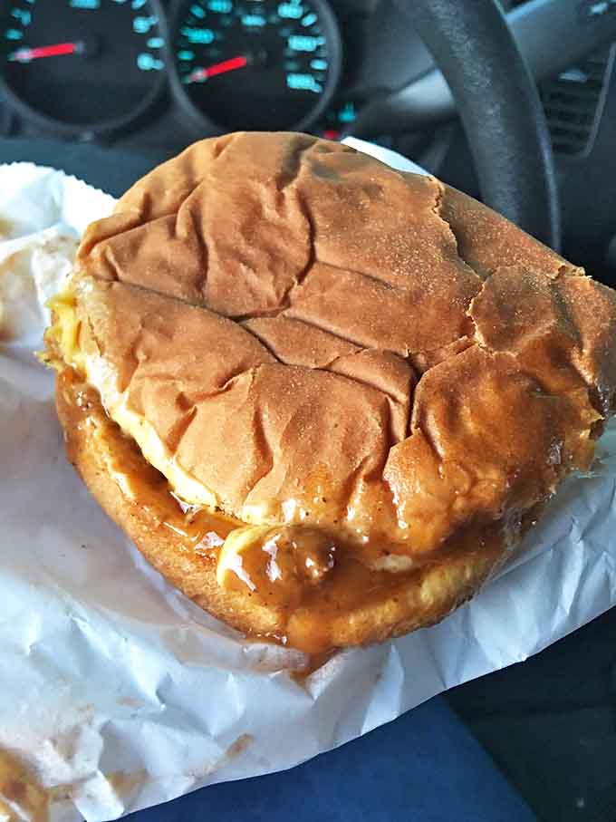 The chili cheeseburger sits triumphantly on its paper throne, the slightly squished bun evidence of the generous fillings within. Worth every napkin you'll need.