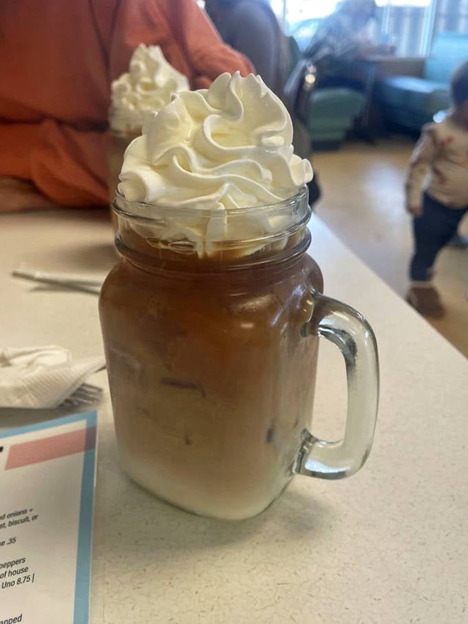 Cold brew topped with a cloud of whipped cream—because sometimes your coffee deserves to wear a fancy hat.