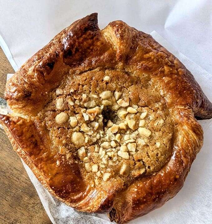 This Danish isn't just pastry &ndash; it's a buttery throne for hazelnut filling, with edges that curl up as if to keep the goodness from escaping.