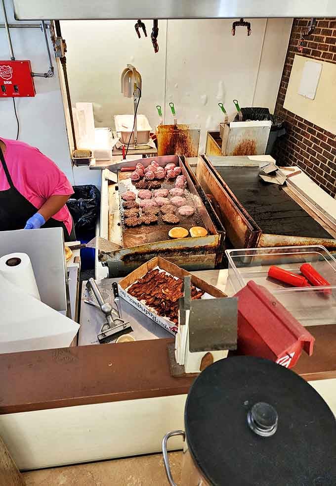 Behind-the-scenes burger alchemy where patties sizzle on a well-seasoned grill. No molecular gastronomy here&mdash;just time-honored techniques that deliver consistent perfection.
