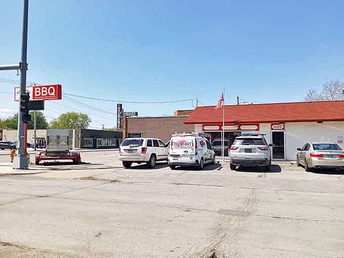 Parking lot filled with vehicles from all walks of life. Good barbecue is the great equalizer in Nebraska's culinary landscape.