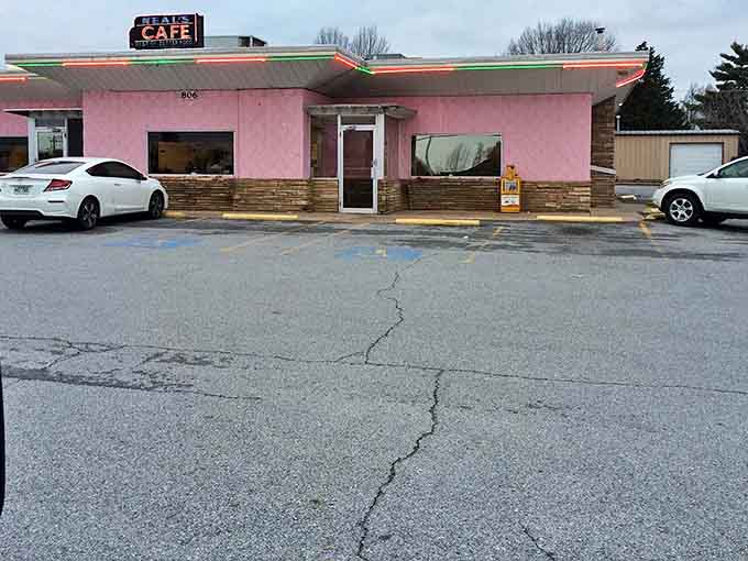 Even on a gray day, that pink building stands out like a flamingo in a parking lot, promising warmth inside.