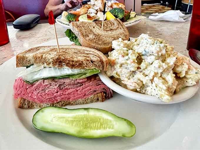 A sandwich that requires jaw exercises beforehand. That mountain of roast beef with creamy potato salad is worth every delicious calorie.