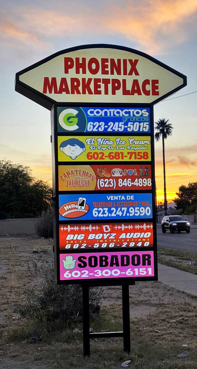 The marketplace sign glows against an Arizona sunset, a beacon for deal-seekers and treasure hunters alike.