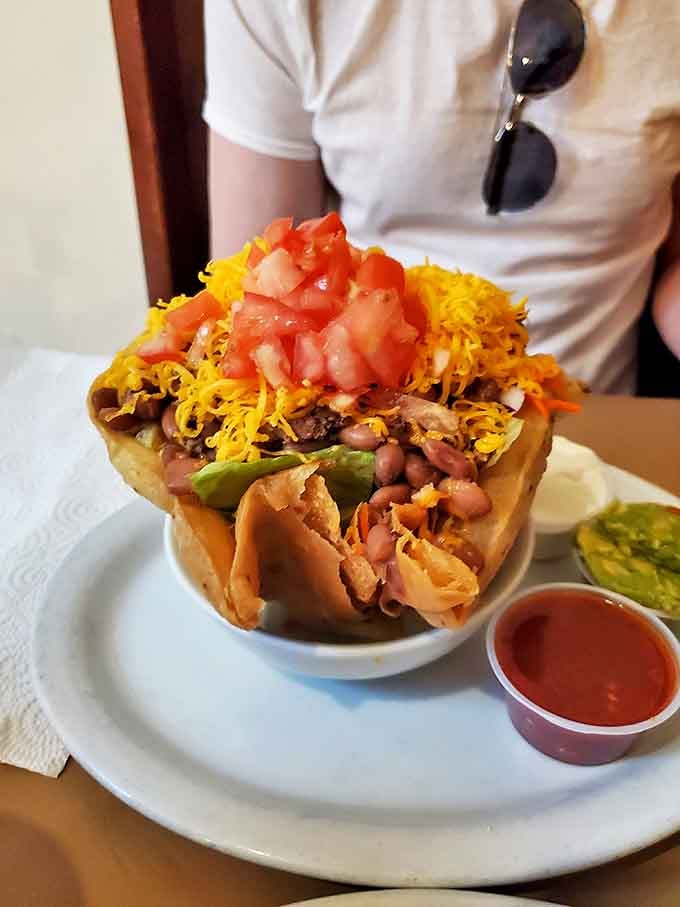 A taco salad that refuses to be just a healthy option. That crispy shell cradles beans, meat, and enough toppings to make a salad feel like a celebration.