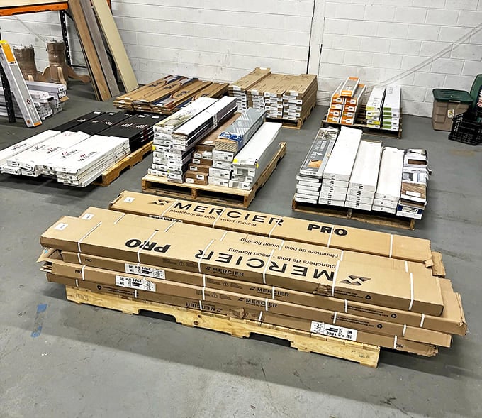 Stacks of pristine flooring waiting to rescue your tired floors from looking like a before photo on renovation shows.