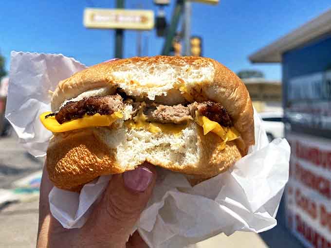 Half-eaten because waiting to take a photo was simply asking too much. Some burgers demand immediate attention&mdash;this is definitely one of them.