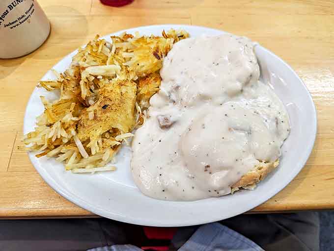 Biscuits and gravy that could make a Southern grandmother nod in approval&mdash;a creamy, peppery blanket covering tender biscuits with comforting authority.