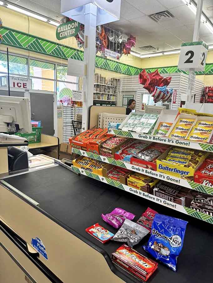 Checkout lane temptations arranged with psychological precision – because no shopping trip is complete without one last impulse purchase.