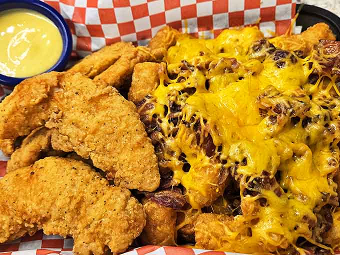 Chicken fingers and loaded fries&mdash;comfort food that doesn't need a fancy introduction. This plate says "I'm not here to judge, I'm here to satisfy."