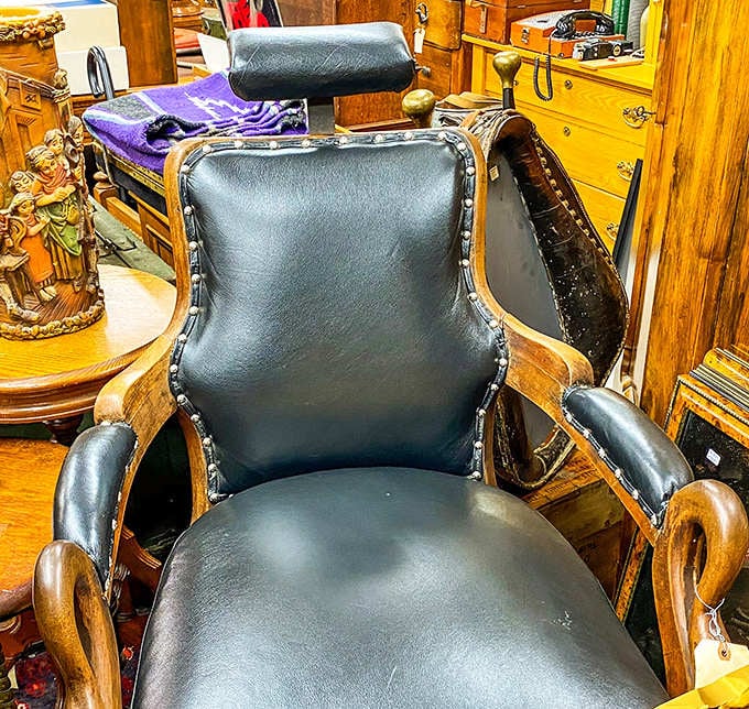 This antique barber chair isn't just furniture&mdash;it's a throne where countless men once sat for trims, shaves, and the sacred ritual of neighborhood gossip.