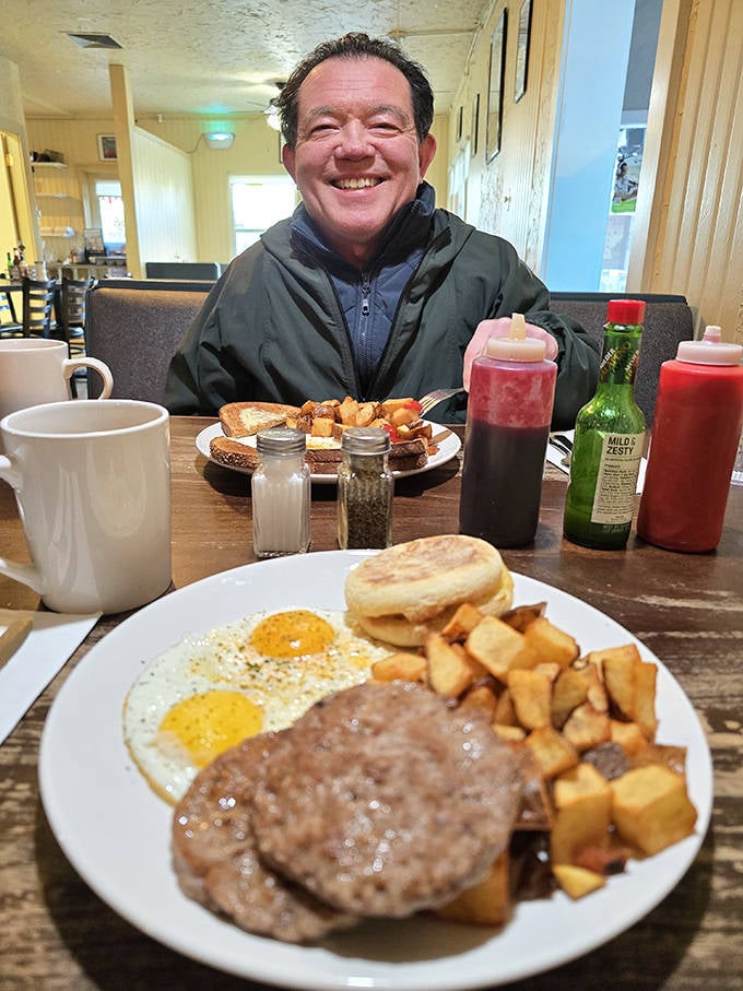 Happy diners enjoying the fruits of Mandy's kitchen labor. That smile says "I've made excellent life choices today."