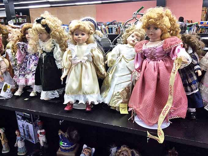 The porcelain parliament&mdash;vintage dolls with perfect curls and permanent expressions that range from "charming" to "might come alive at midnight."