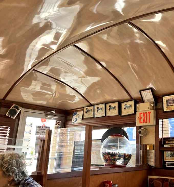 The curved ceiling and vintage decor create that unmistakable diner atmosphere&mdash;like stepping into an Edward Hopper painting where the coffee's always fresh.