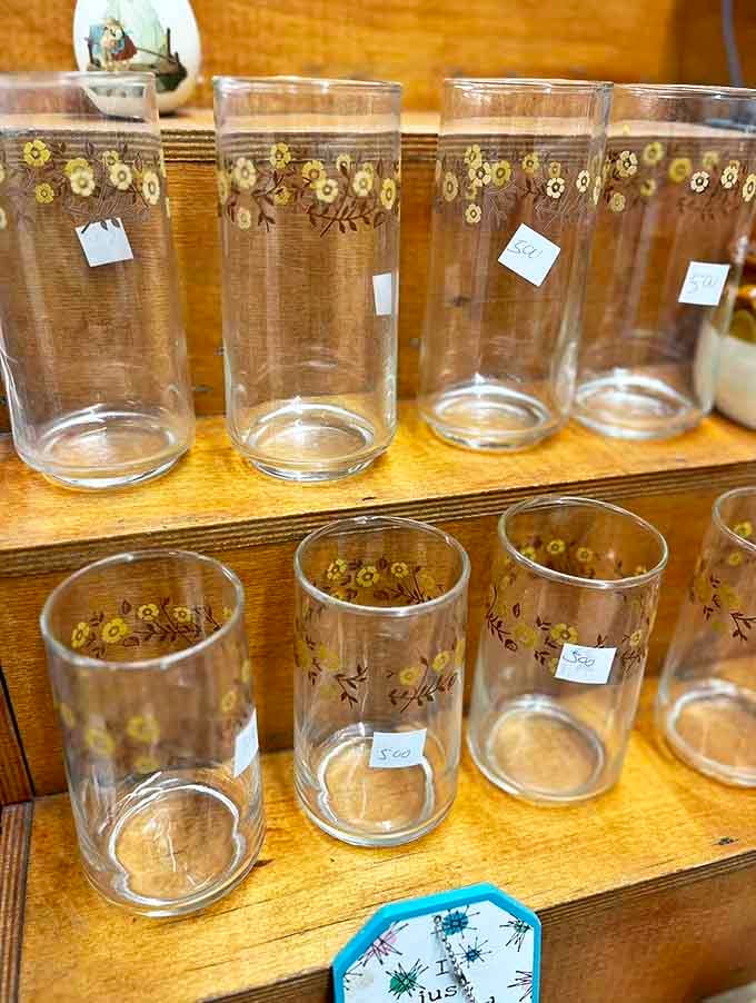 Vintage glassware with delicate floral patterns stands ready to elevate your next dinner party from "nice" to "where did you find these gems?"
