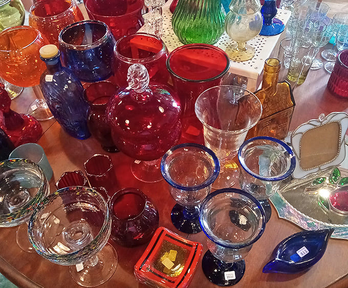Colored glassware catches the light like liquid jewels&mdash;each piece waiting to become the star of your next dinner party.