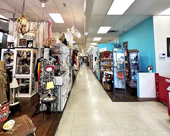 The antique mall's main artery, where serious collectors and casual browsers alike follow the siren call of vintage treasures.