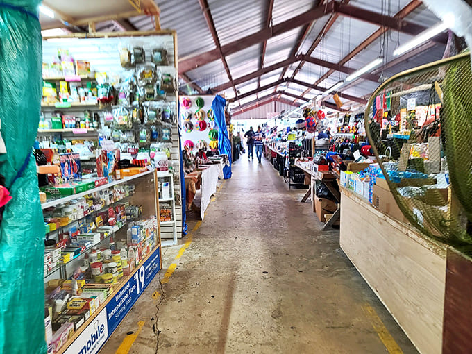 Everyday essentials mingle with unexpected finds in this covered walkway. The narrow aisles create a sense of adventure&mdash;what's around the next corner?