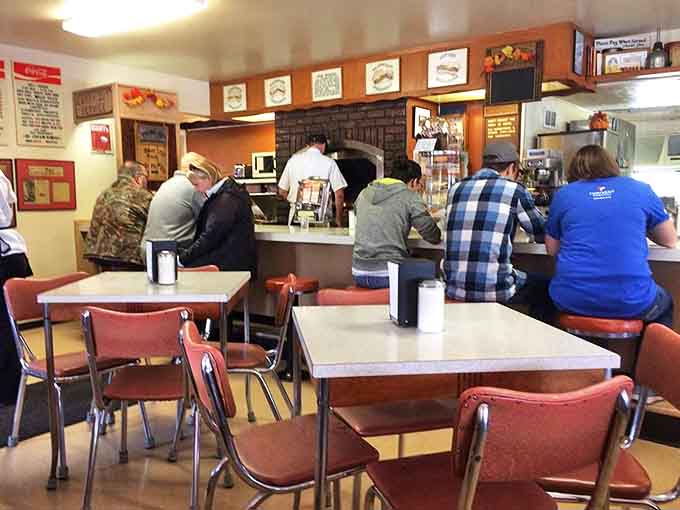 Mickey-Lu's dining room feels like America's living room. These tables have hosted first dates, family celebrations, and countless "remember when" conversations over the decades.