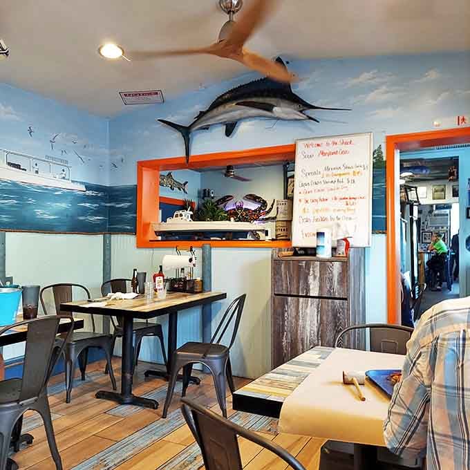 Nautical d&eacute;cor that says, "Yes, we know we're in West Virginia, but our hearts belong to the sea." That marlin has seen some things.